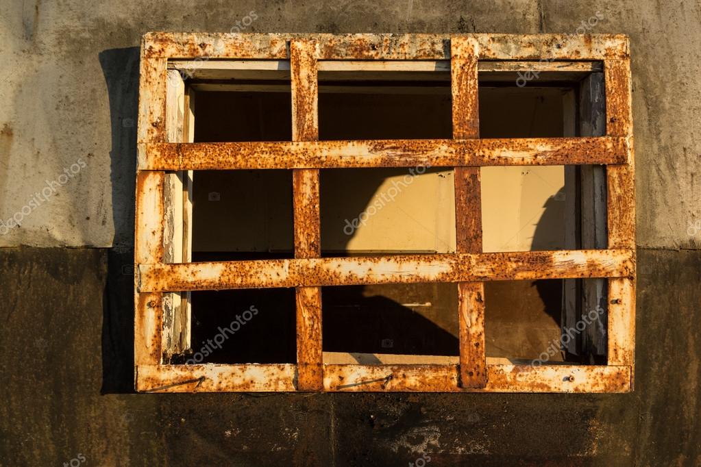 Rusty iron bars on the window — Stock Photo © Xagis #81182710