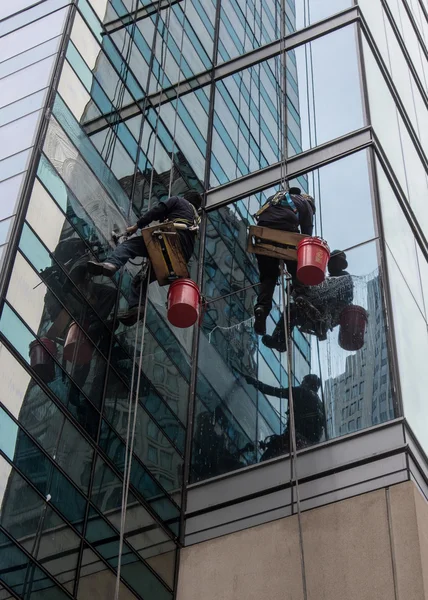 Window washers on skyscraper – Stock Editorial Photo © Nyker #111300684