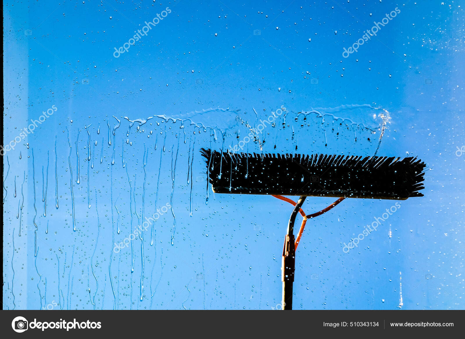 Window cleaning using telescopic water brush and wash system ...