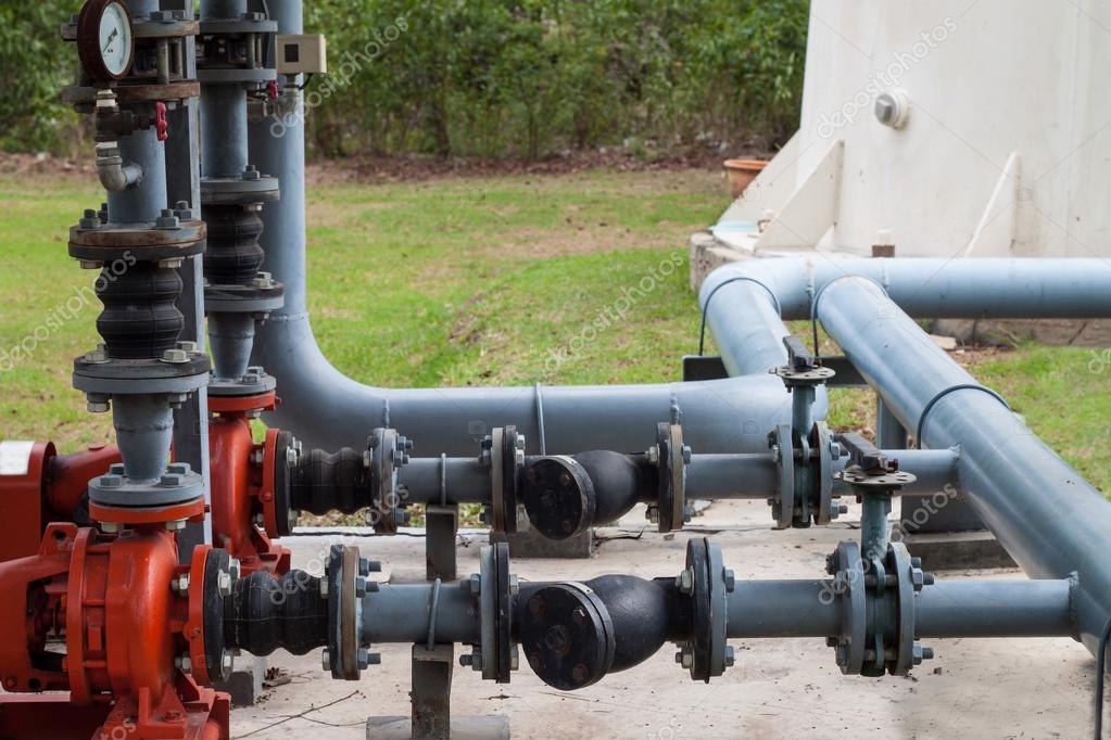 Water pumping and pipes Stock Photo by ©enterphoto 76415509