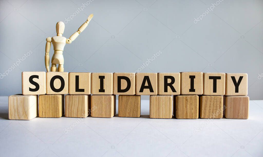 Tiempo para símbolo de solidaridad. Concepto palabra solidaridad sobre ...