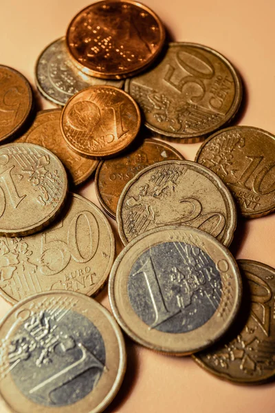 Different euro coins. Metallic cents of Europe. Golden, silver and ...
