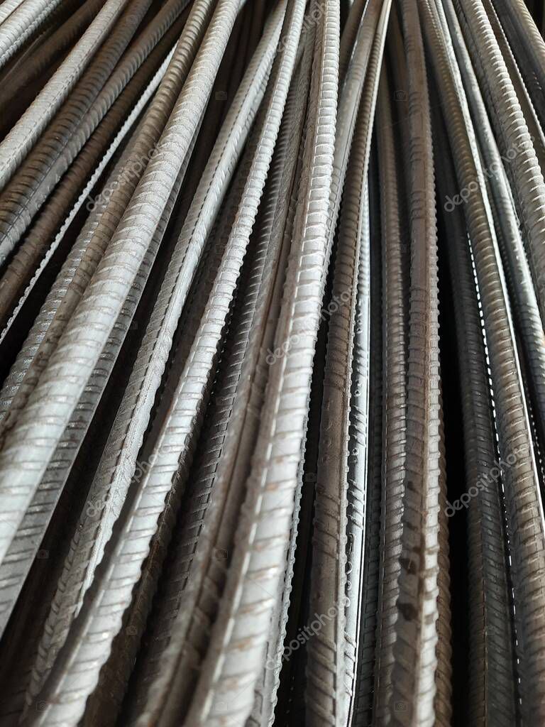 Closeup of building construction material mild steel tmt bars in the size of 16, 8, 10 and 12mm ...