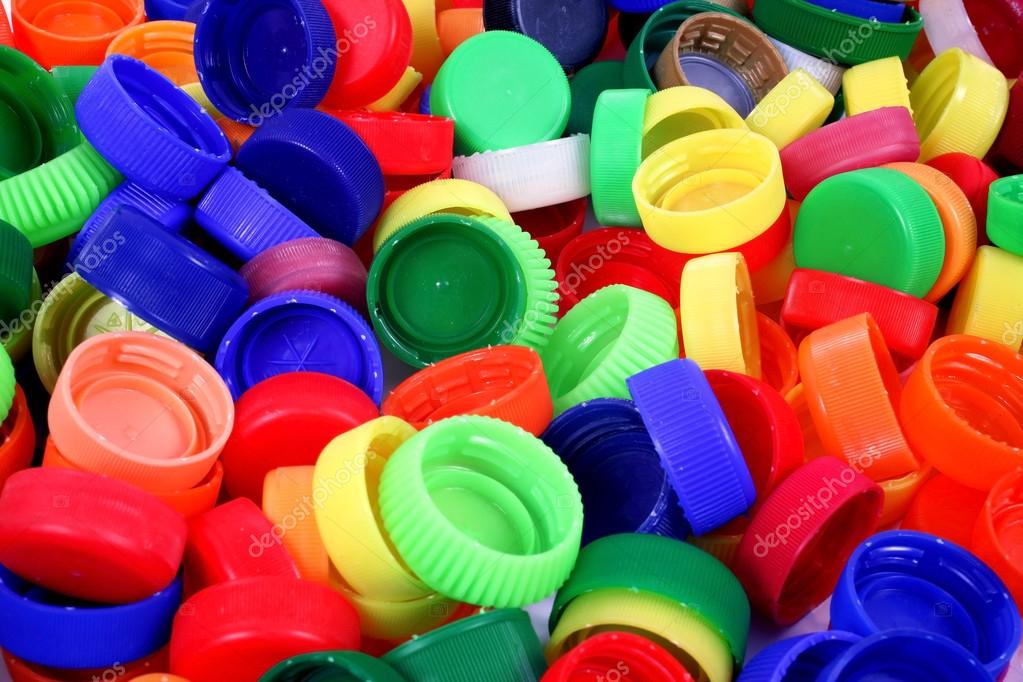 Color plastic caps background Stock Photo by ©MartinLisner 60261447