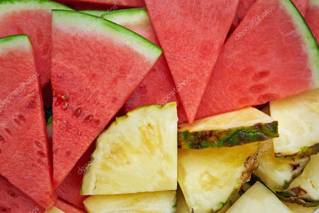Sliced pineapple and watermelon — Stock Photo © DennisJacobsen #116979676 Sliced pineapple and watermelon — Stock Photo © DennisJacobsen #116979676