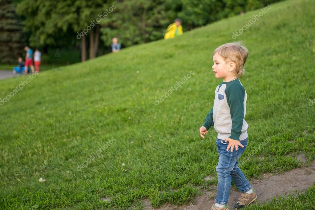 Kid walks in the park — Stock Photo © Serg0403 #113679586