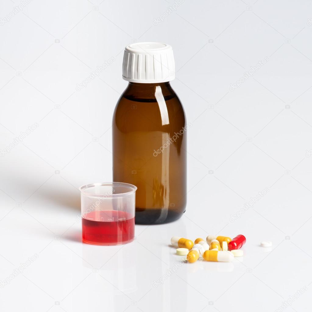 Cough syrup Stock Photo by ©Ablozhka 71122649