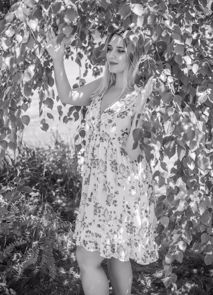 Happy plus size model on the nature. Portrait of the beautiful large ...