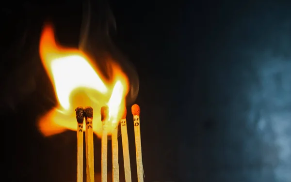 Group of a red match burning isolated with the background. Row burning ...