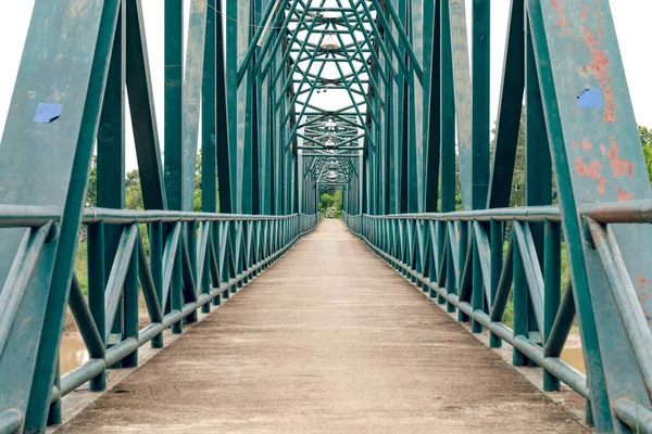 Green iron bridge across the rive - Stock Image - Everypixel