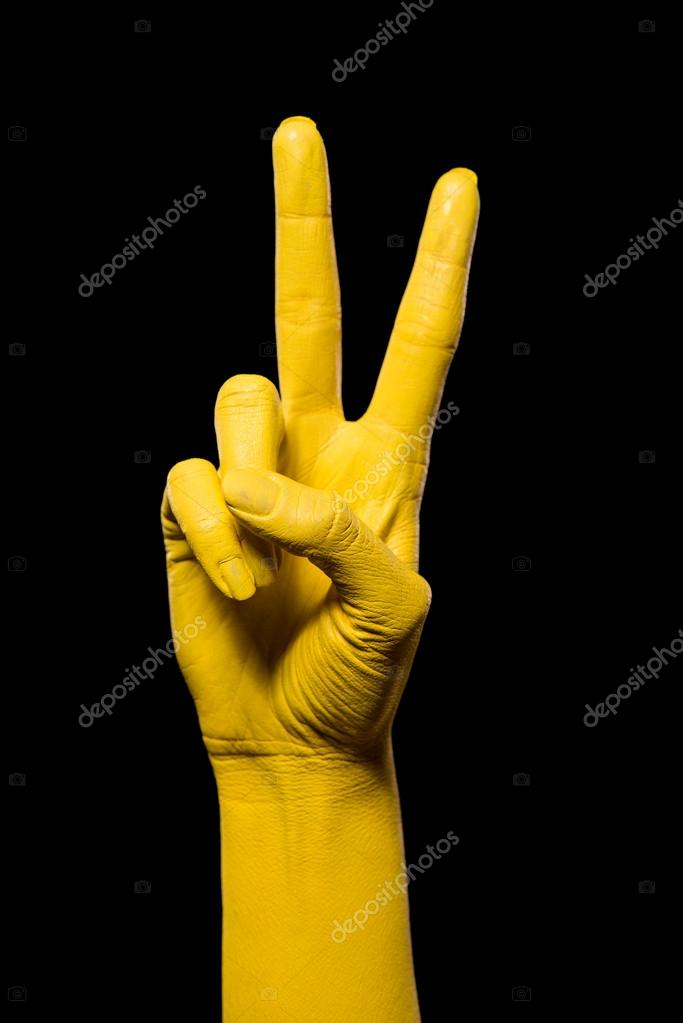 Yellow hand showing two fingers. Stock Photo by ©chika_milan 110244520