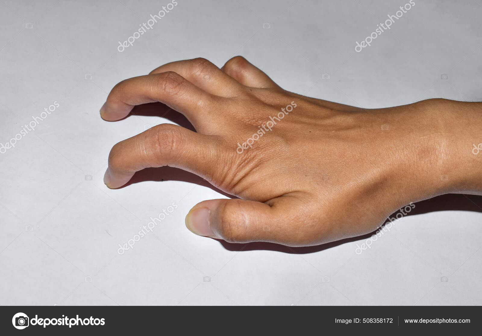 Southeast Asian Chinese Young Man Hand Gripping Hand Exercise Gripper ...