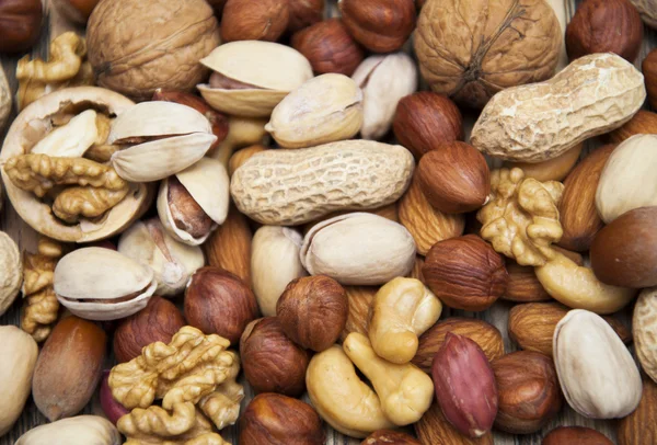 Nuts. Background — Stock Photo © ArtemSam #24574847