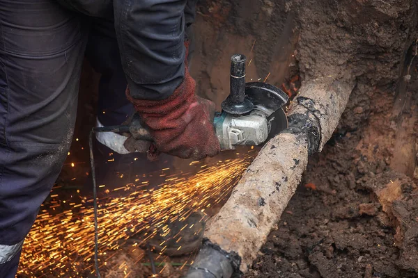 a man in working form is working on production, factory physical labor ...