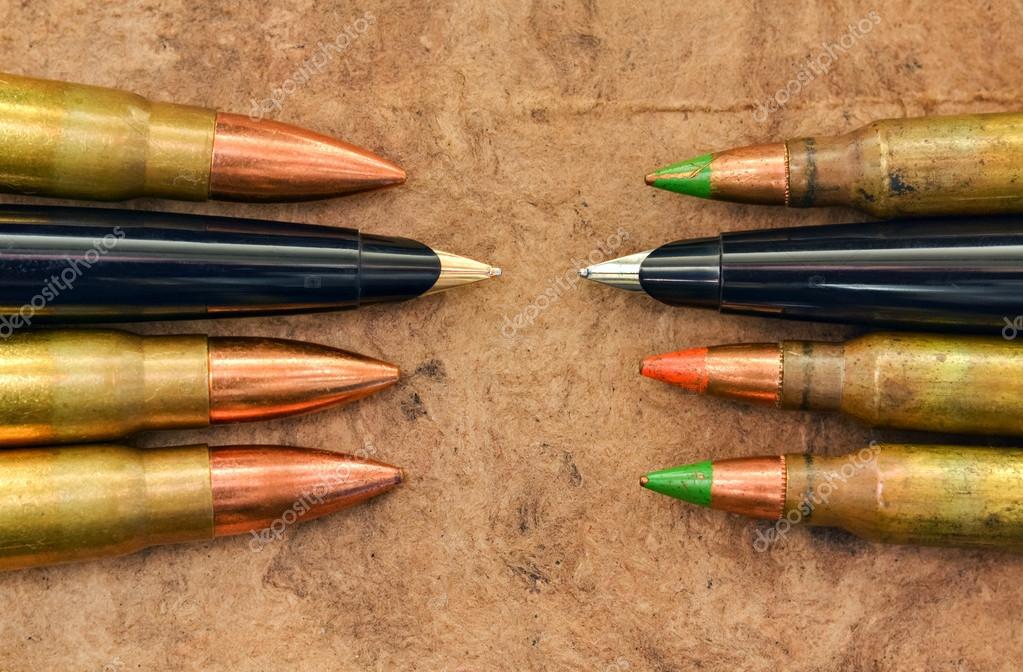 Pens and bullets Stock Photo by ©benjaminec 64497975