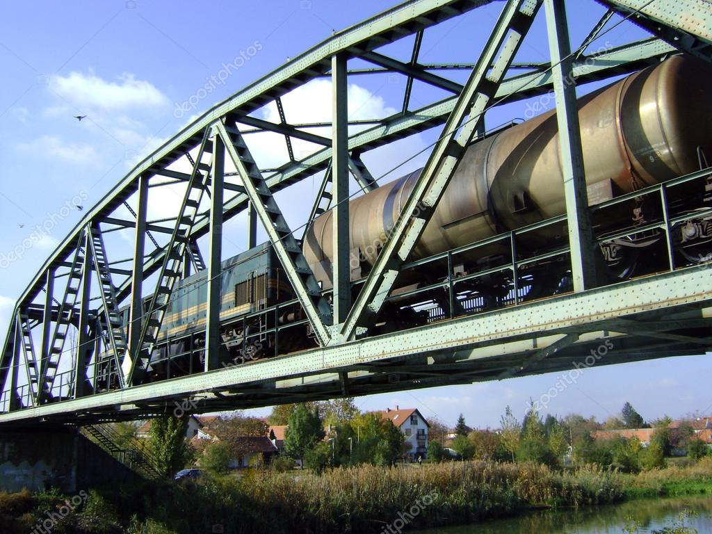 Freight train on the bridge — Stock Photo © banedeki #63510569