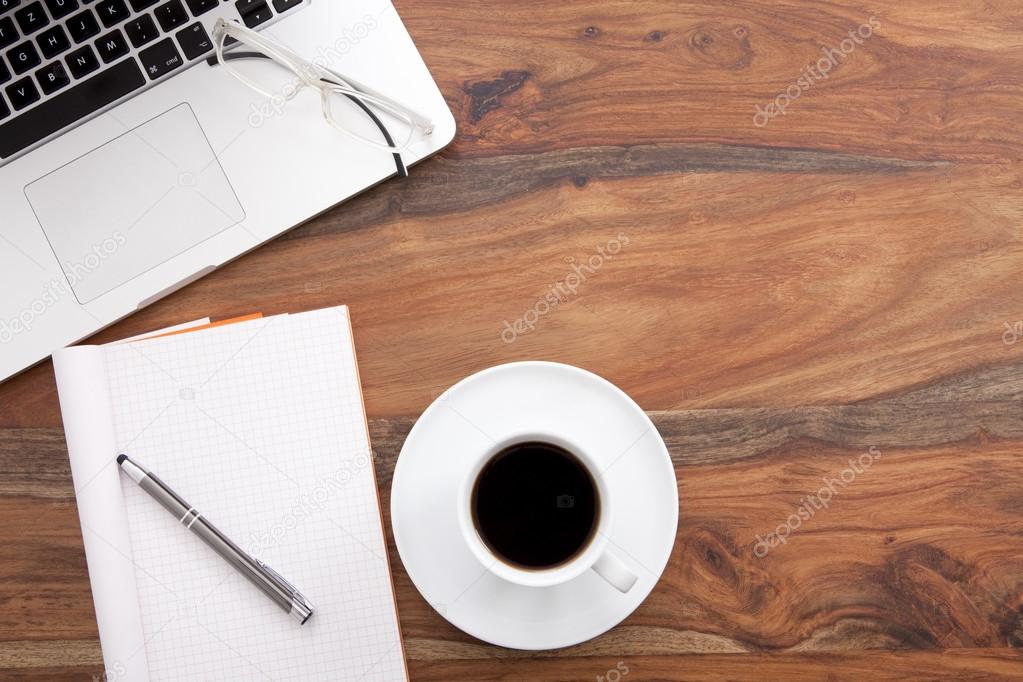 Office desk with cup of coffee and empty paper, copy space — Stock ...
