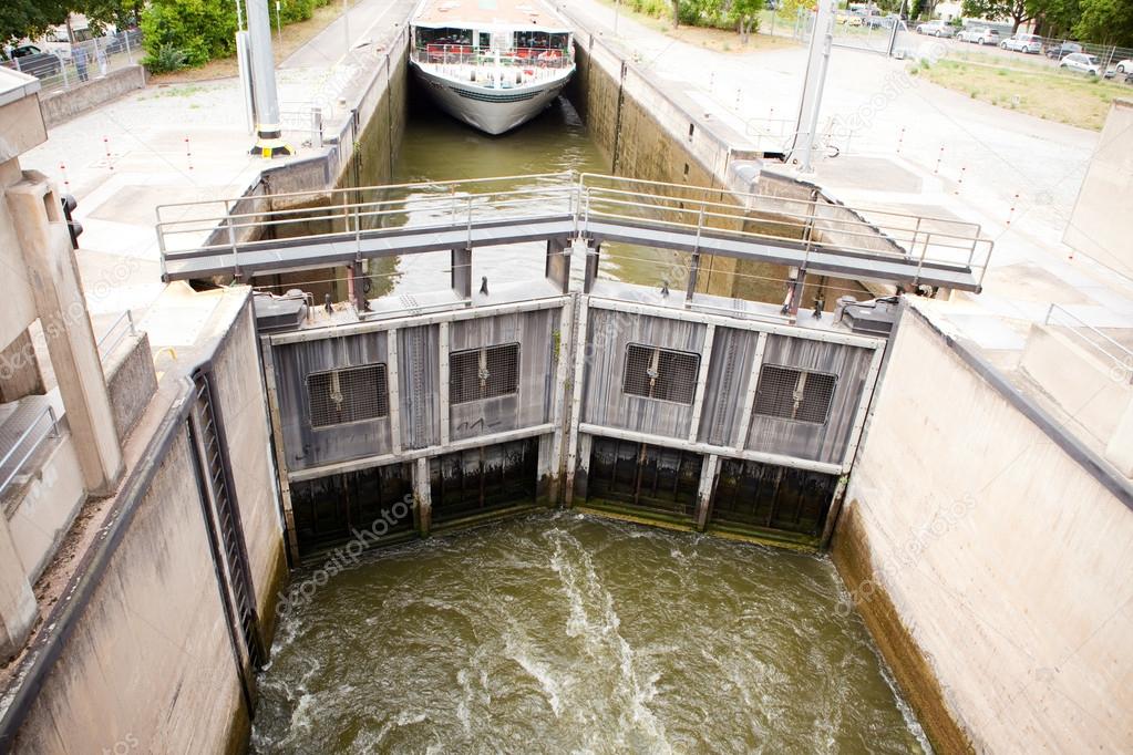Ship lock opening for cargo boat — Stock Photo © madorf #78884810