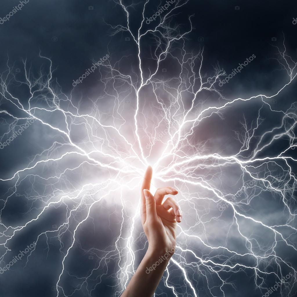 Hand over stormy lightning sky Stock Photo by ©4masik 61061169