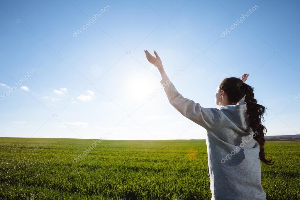 Woman praying outside — Stock Photo © 4masik #72017709
