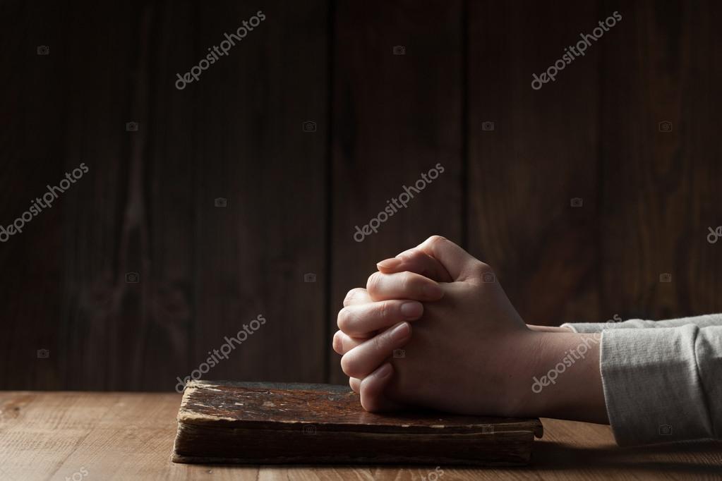 Hands folded in prayer Stock Photo by ©4masik 72123115