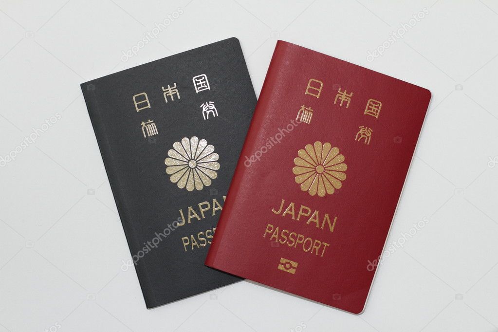 Japanese passports (red and blue) #100868628 - Larastock
