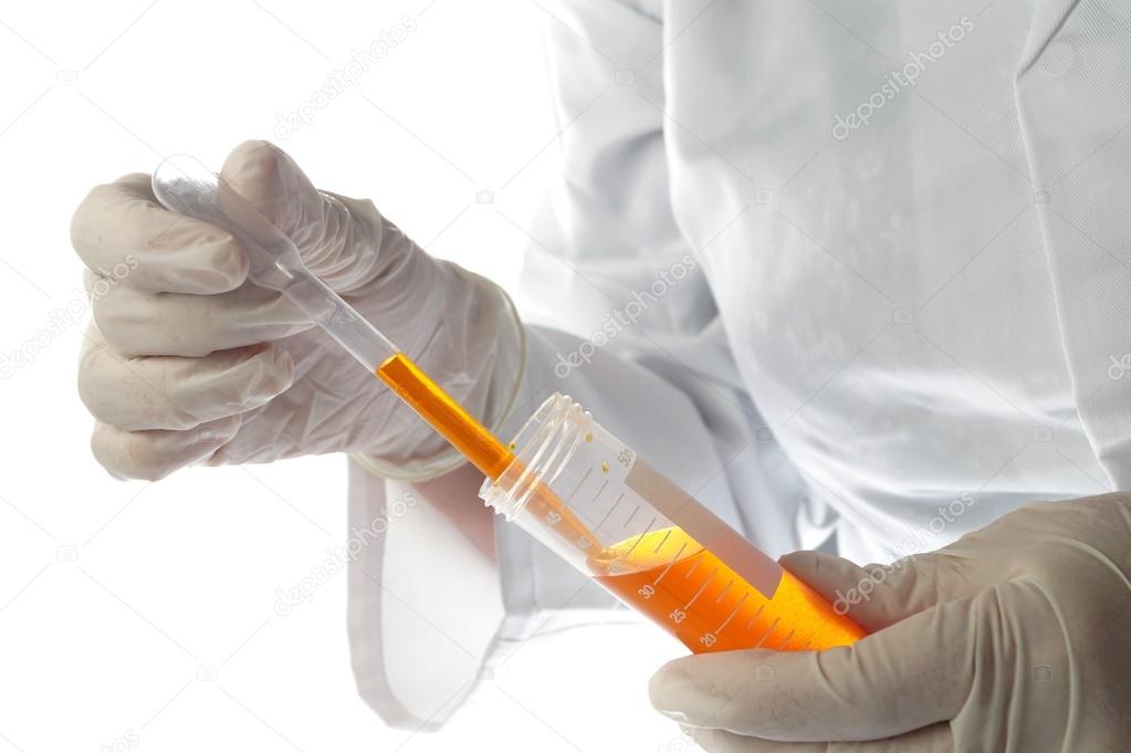 Testing liquid lab sample - Urine Stock Photo by ©Esbenklinker 53353195