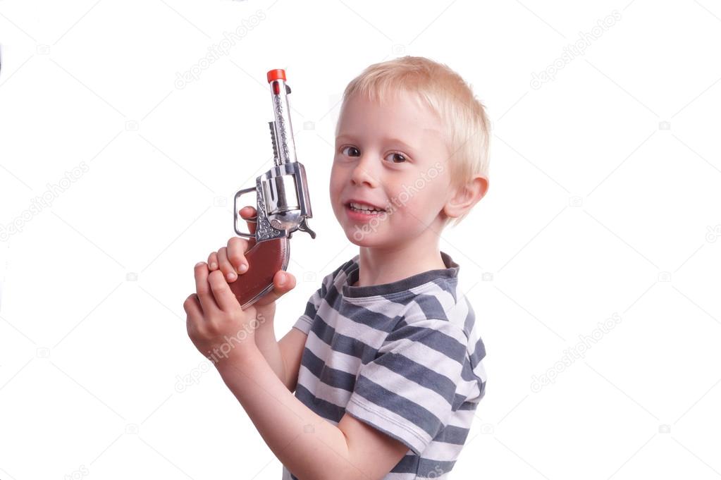 Child with gun. Stock Photo by ©Esbenklinker 72645635