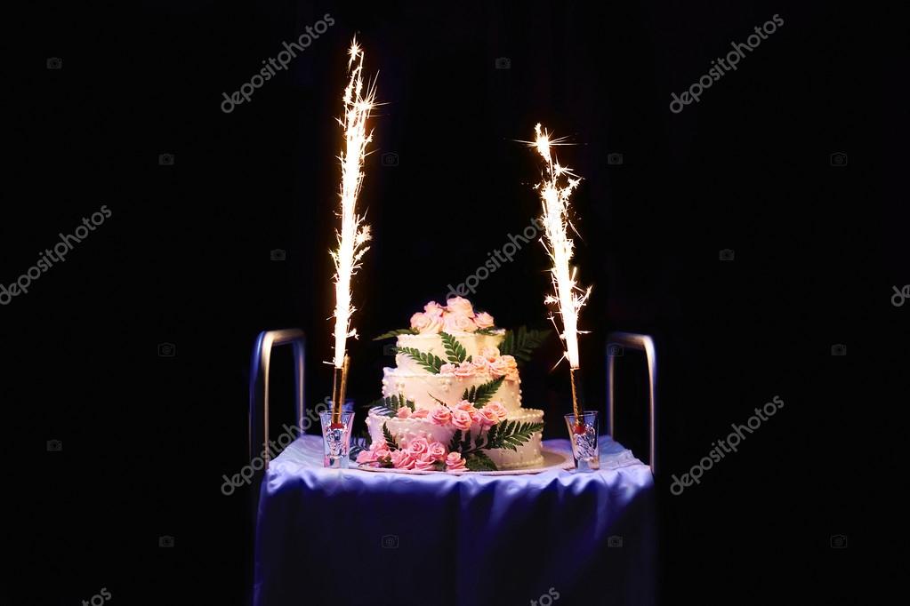 Holiday cake with fireworks Stock Photo by ©Guas 52918601