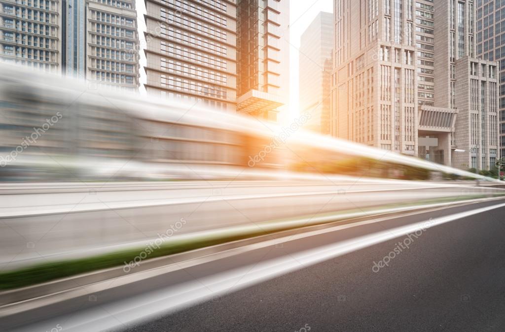 Blurred city road at sunset Stock Photo by ©zorabc 101070236