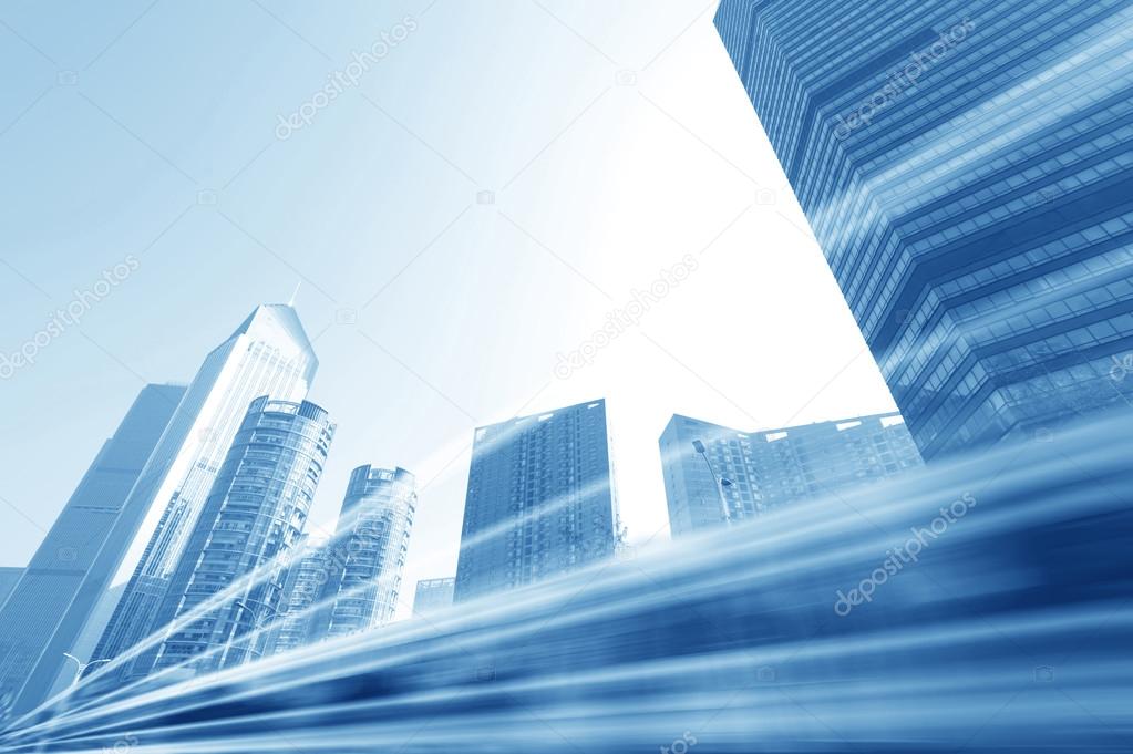 Light trails on buildings background Stock Photo by ©zorabc 66258791