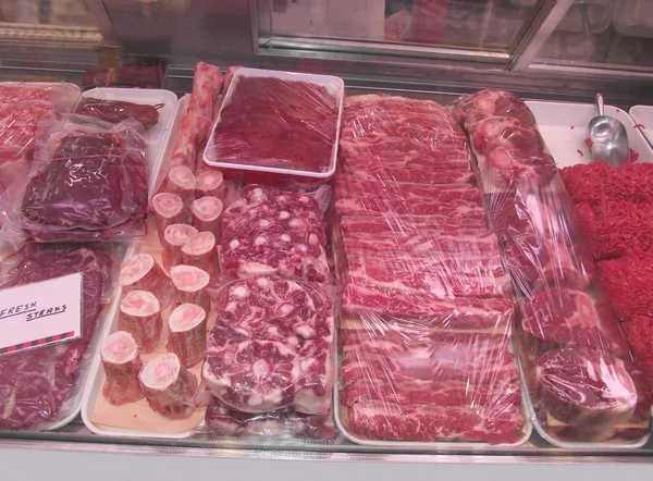 fresh meat display in a showcase refrigerator for butchery market ...