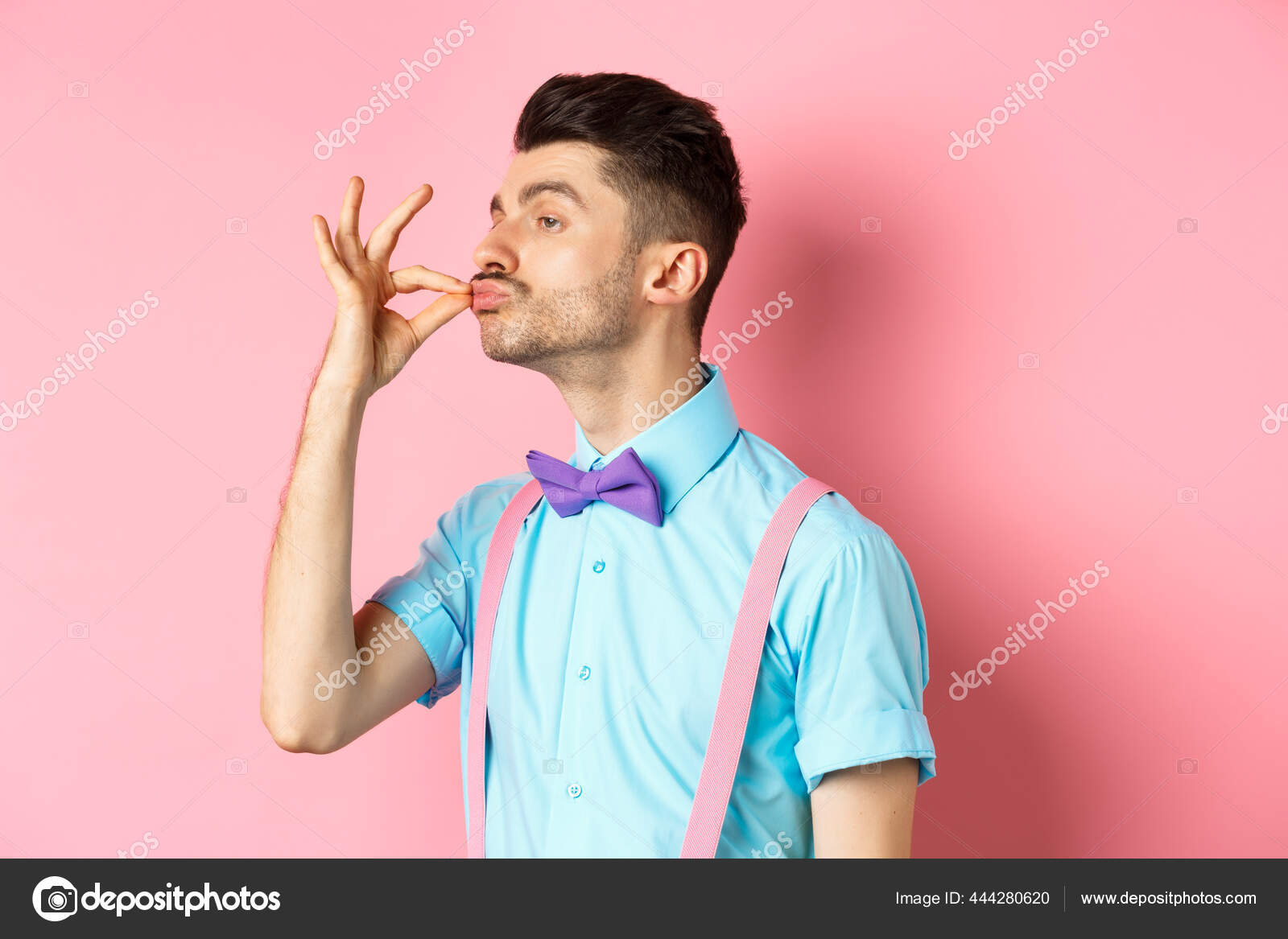 Profile of funny guy touching his french moustache and pucker lips like ...