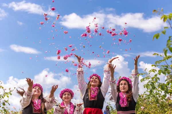 Throwing roses in the air — Stock Photo © nikolay100 #115383902