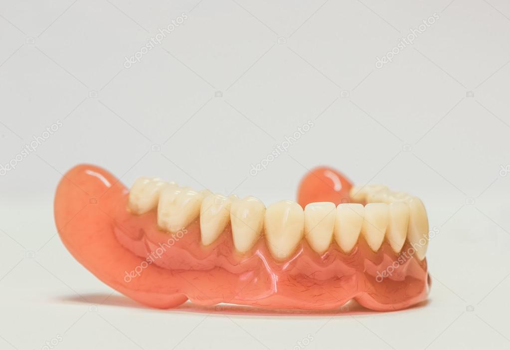 Dental dentures isolated on white — Stock Photo © bedya #59525121