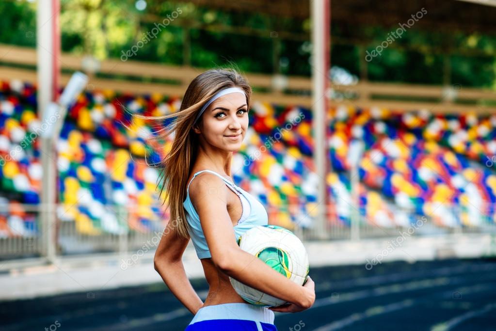 Woman in blue shorts workout — Stock Photo © bedya #84984818