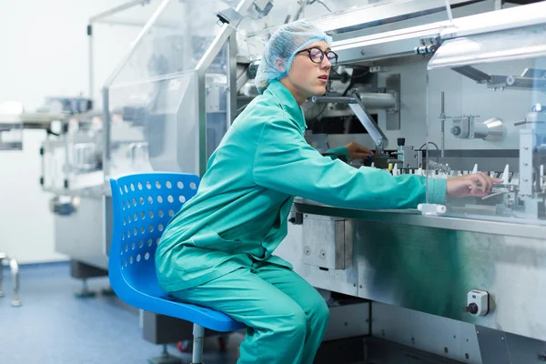 Pharmaceutical factory worker at the workplace - Stock Image - Everypixel