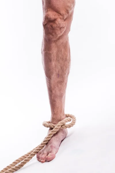 Rope holding human leg ailing varicose veins of the lower extrem Stock ...
