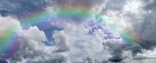 Cumulus cloud rainbow - Stock Image - Everypixel