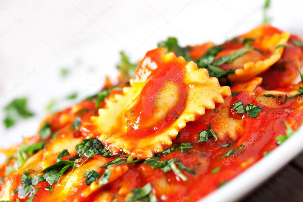 Ravioli with tomato sauce Stock Photo by ©svariophoto 73843635