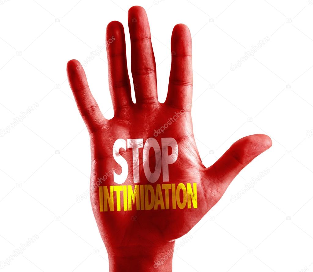 Stop Intimidation written on hand Stock Photo by ©gustavofrazao 100044774