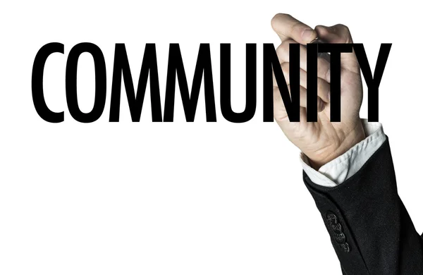 Hand writting the word community — Stock Photo © gustavofrazao #82388186
