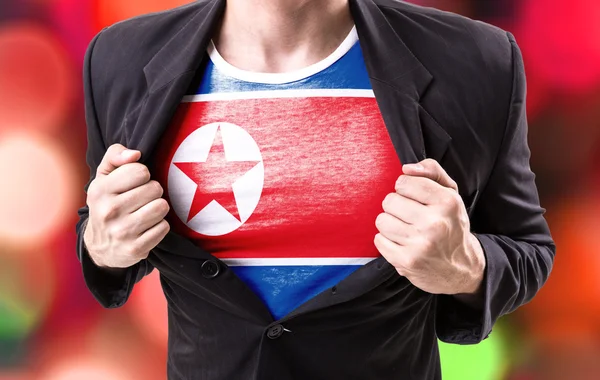 Businessman stretching suit — Stock Photo © gustavofrazao #84025314