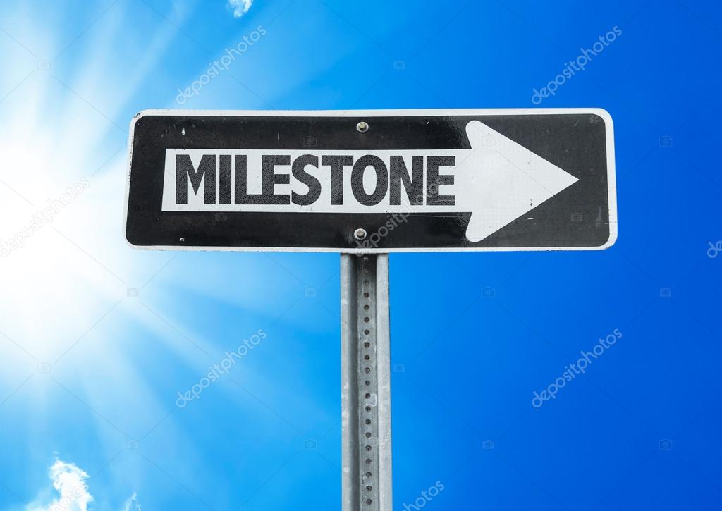 Milestone direction sign Stock Photo by ©gustavofrazao 84036222