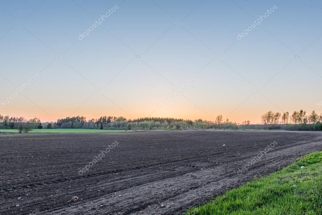Countryside fields in early spring — Stock Photo © martinsvanags #72772093