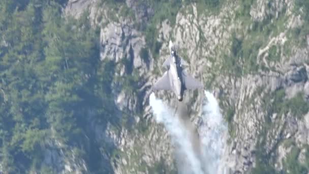 Impressive vertical climb of military aircraft with delta wings near a ...