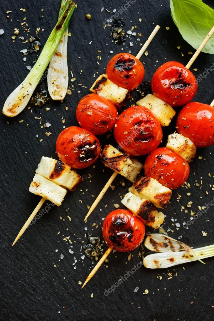 Halloumi cheese and cherry tomato skewers — Stock Photo © zi3000 #80499116