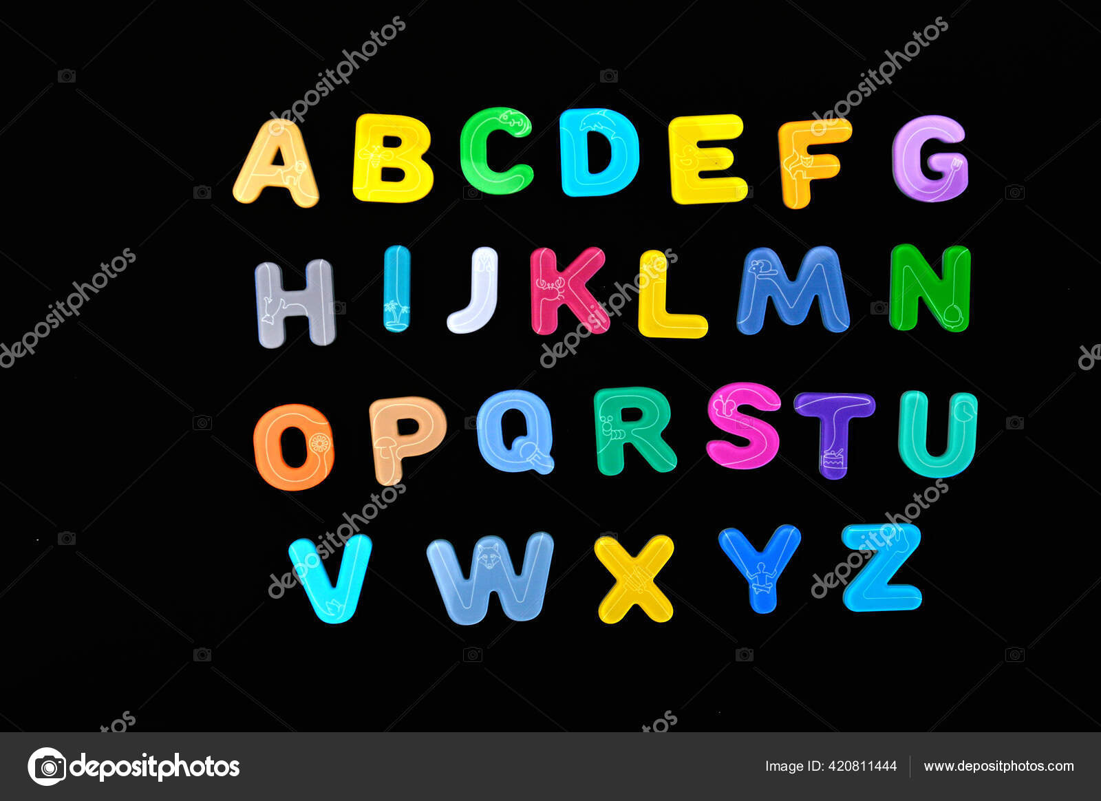 Alphabet Bright Letters Black Background — Stock Photo © DIGSI #420811444