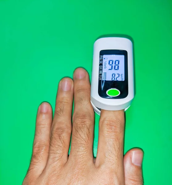 Oxygen finger monitor Stock Photos, Royalty Free Oxygen finger monitor ...