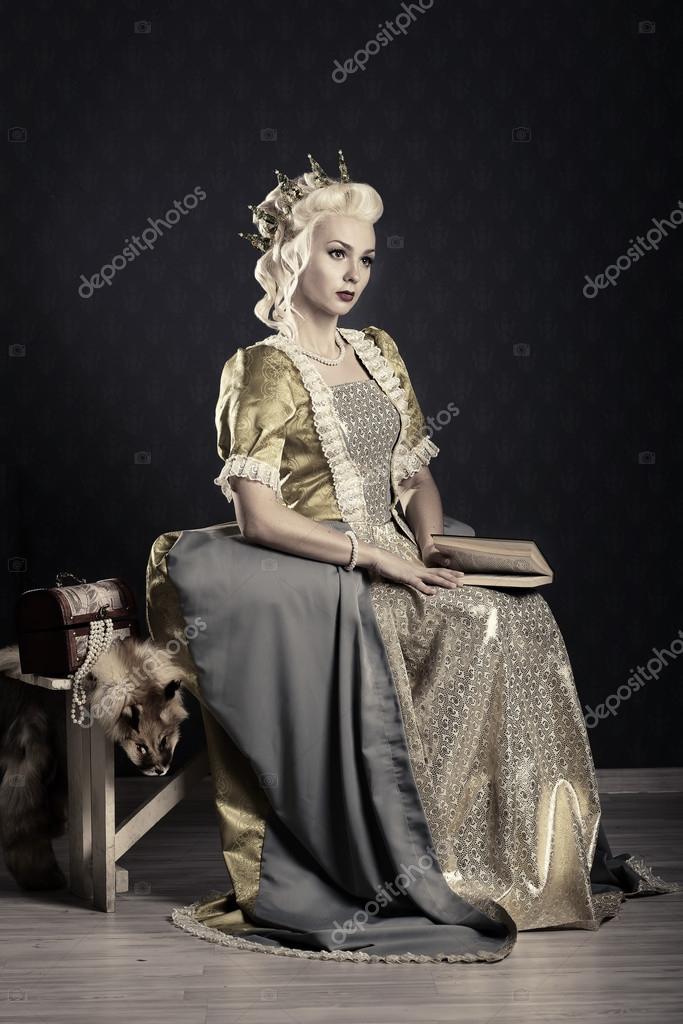 Picture of beautiful haughty queen in royal dress Stock Photo by ©nn ...